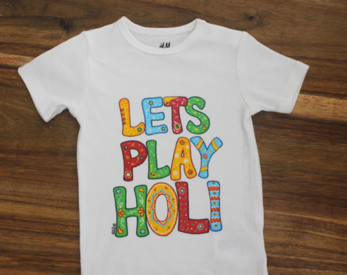 Lets Play Holi Onesie by esbe